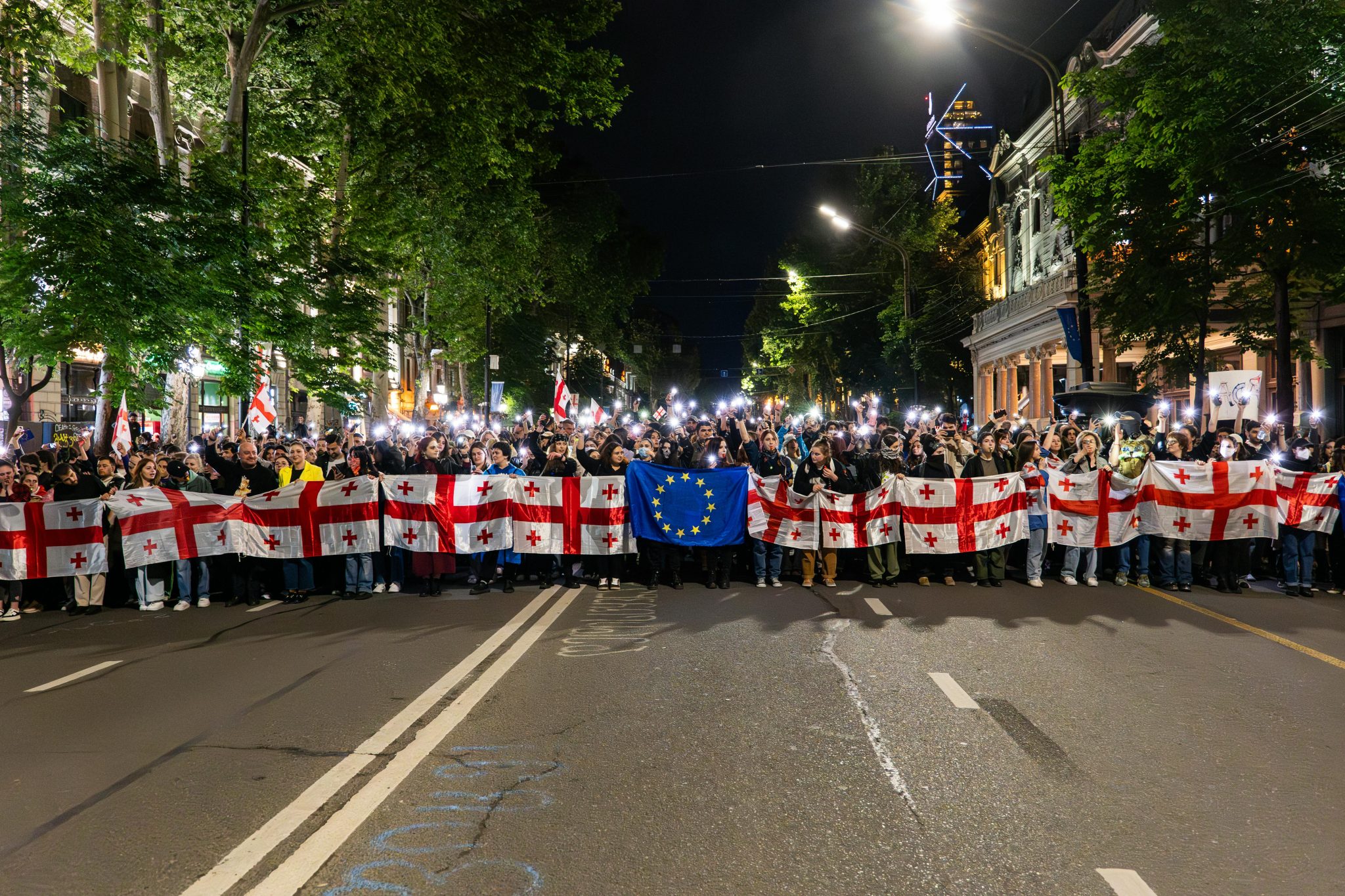 %TI verontrust over vervolgingen in Georgië.